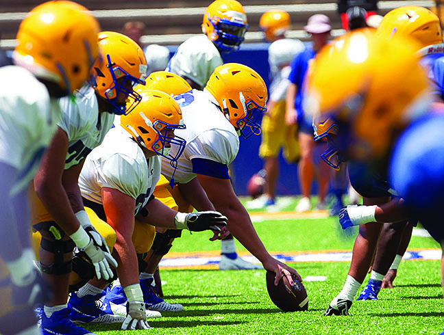 Starting from scratch: Camp opens with big turnover — new coaches ...