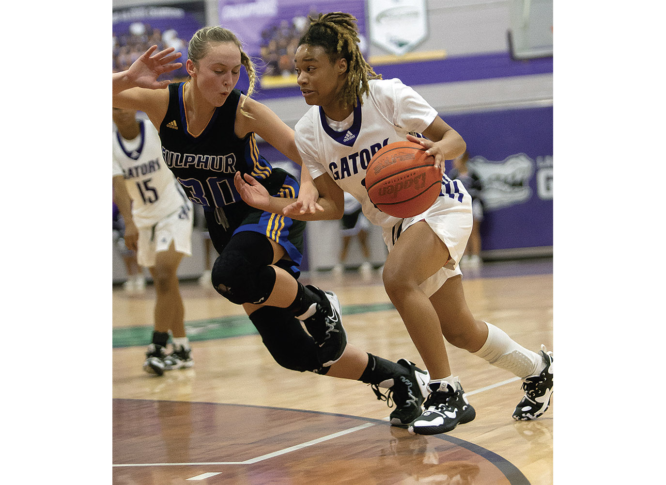 Gators survive, Use late run to edge Tors - American Press | American Press