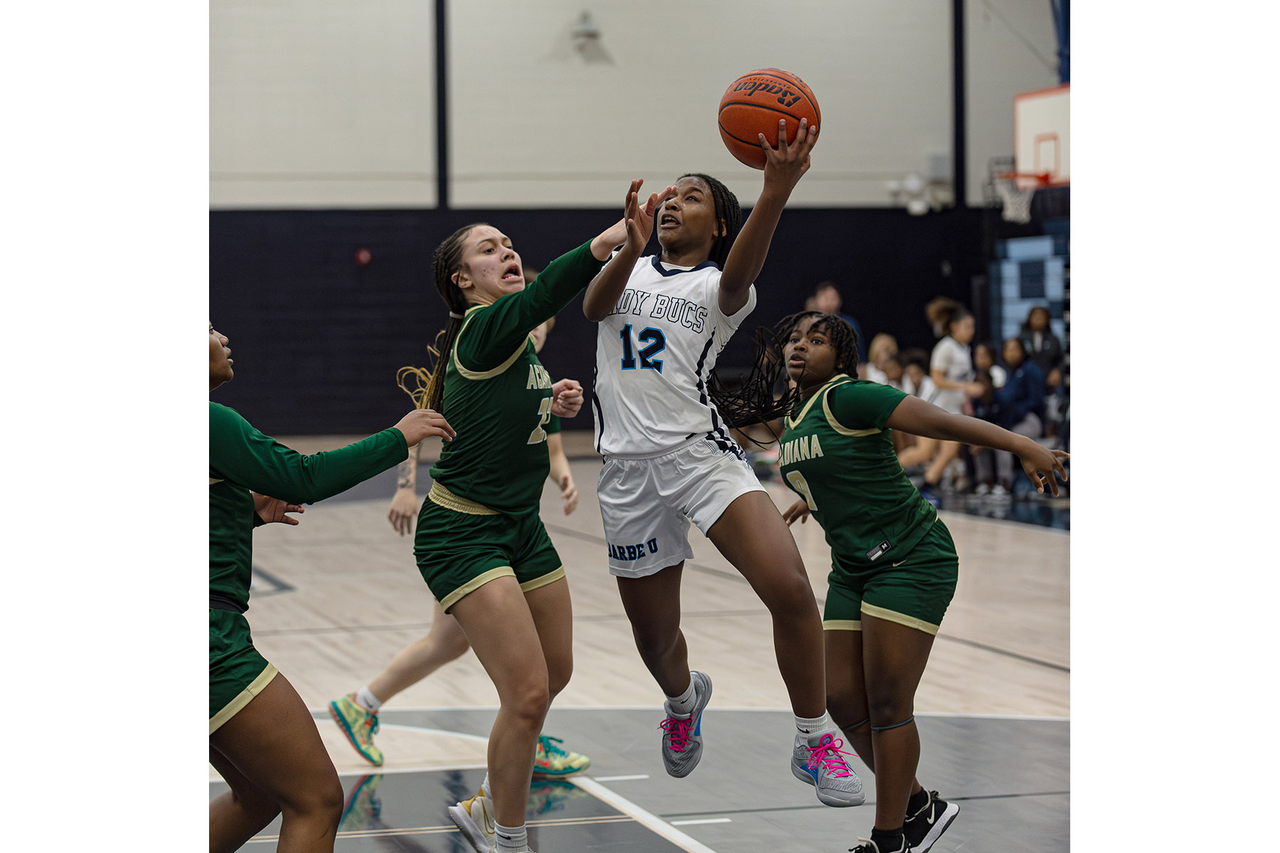 Bucs erase late deficit to win district opener | American Press