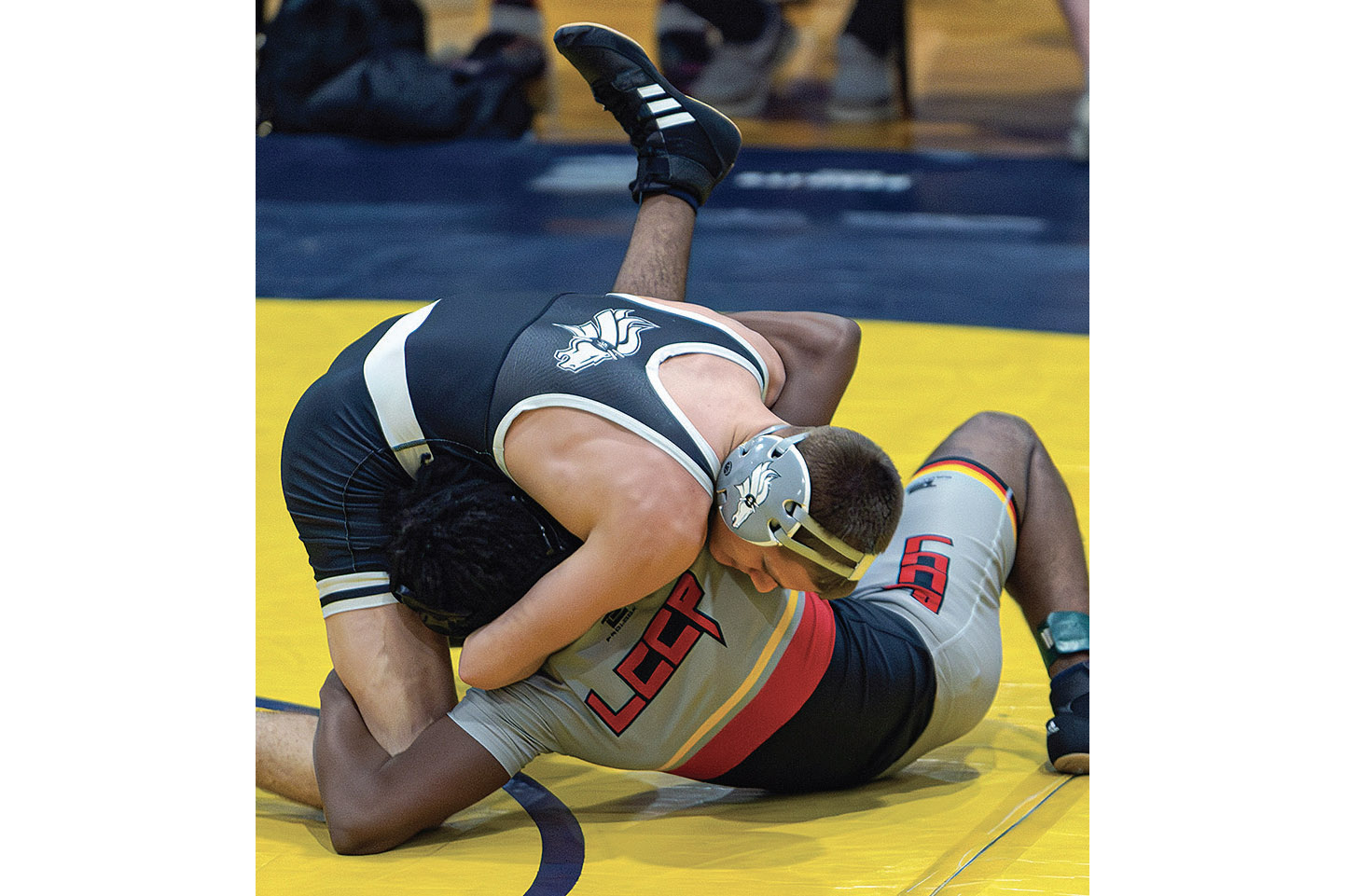 Going to the mat, Roach, Rozas best friends, until match begins ...