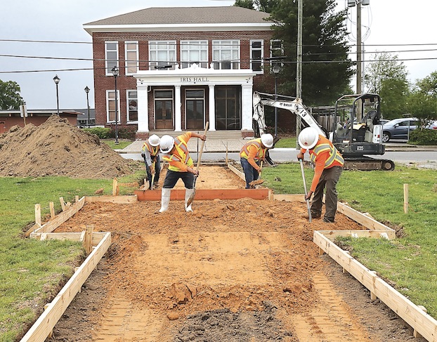 One walkway coming up in front of Iris Hall | American Press