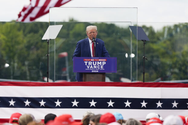 Trump speaks from behind bulletproof glass at first outdoor rally since ...